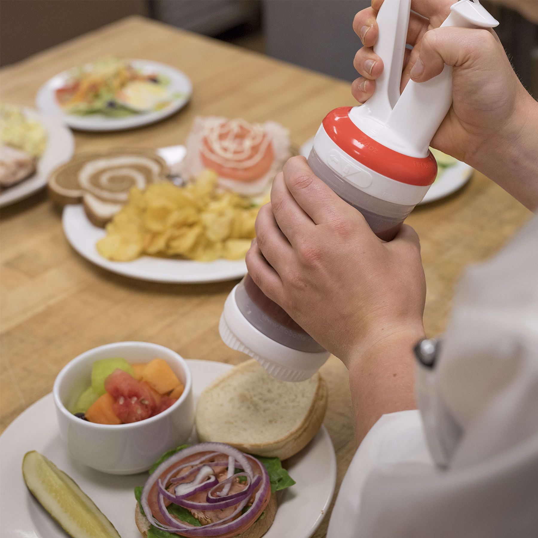 NCCO International Limited. 2-Valve Portion Pal Dispensing Cap